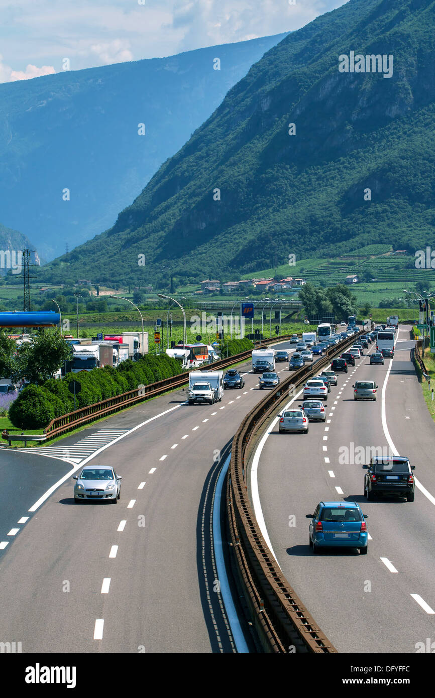 ITALY - JULY 7: Loaded cars driving on the highway during summer ...