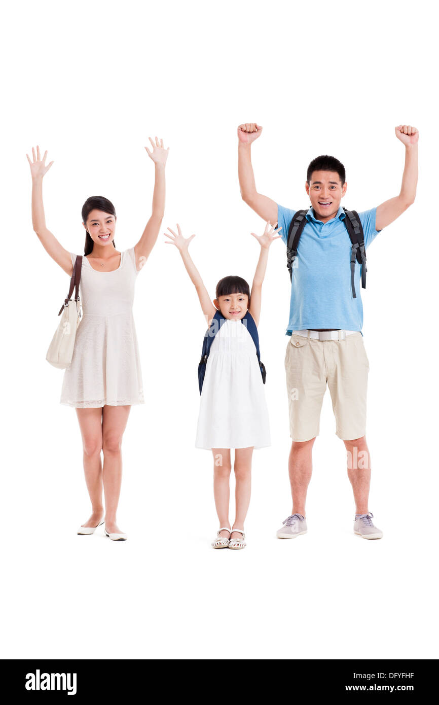 Excited young family raising hands Stock Photo - Alamy