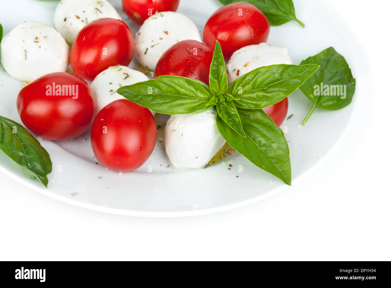 Caprese salad. Isolated on white background Stock Photo - Alamy