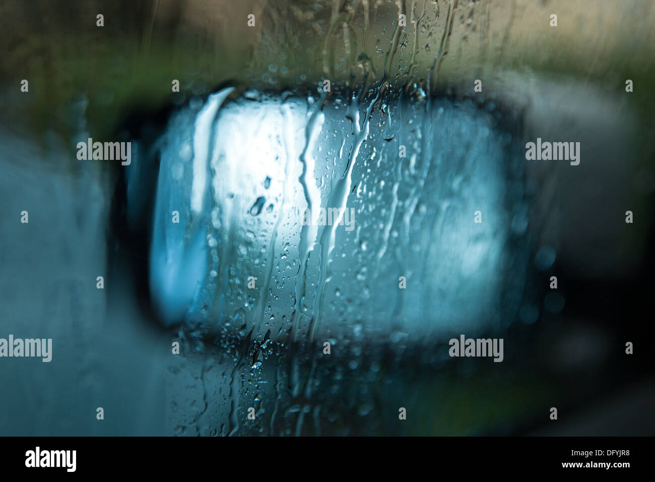 Rain, wet view through car window Stock Photo - Alamy