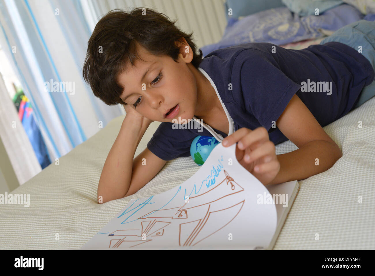 Boy making plans for the future Stock Photo - Alamy