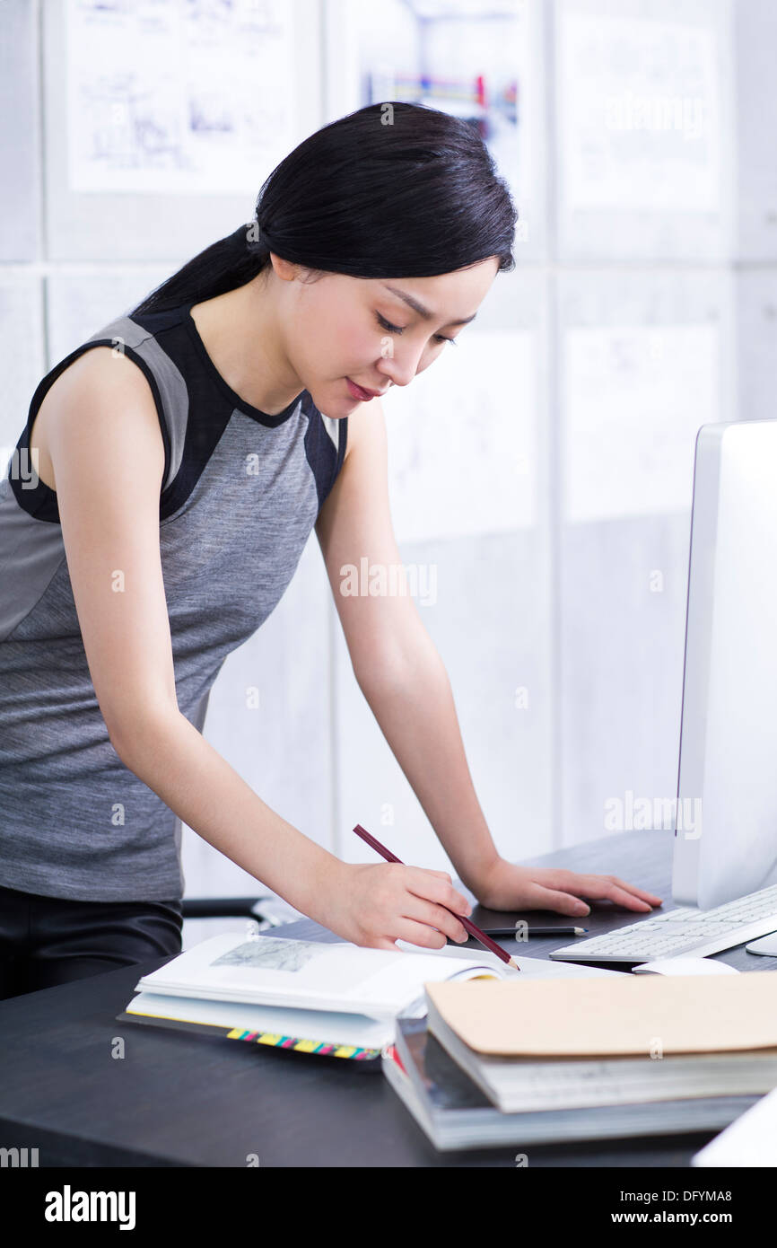 Working concentration looking up effort hi-res stock photography and ...