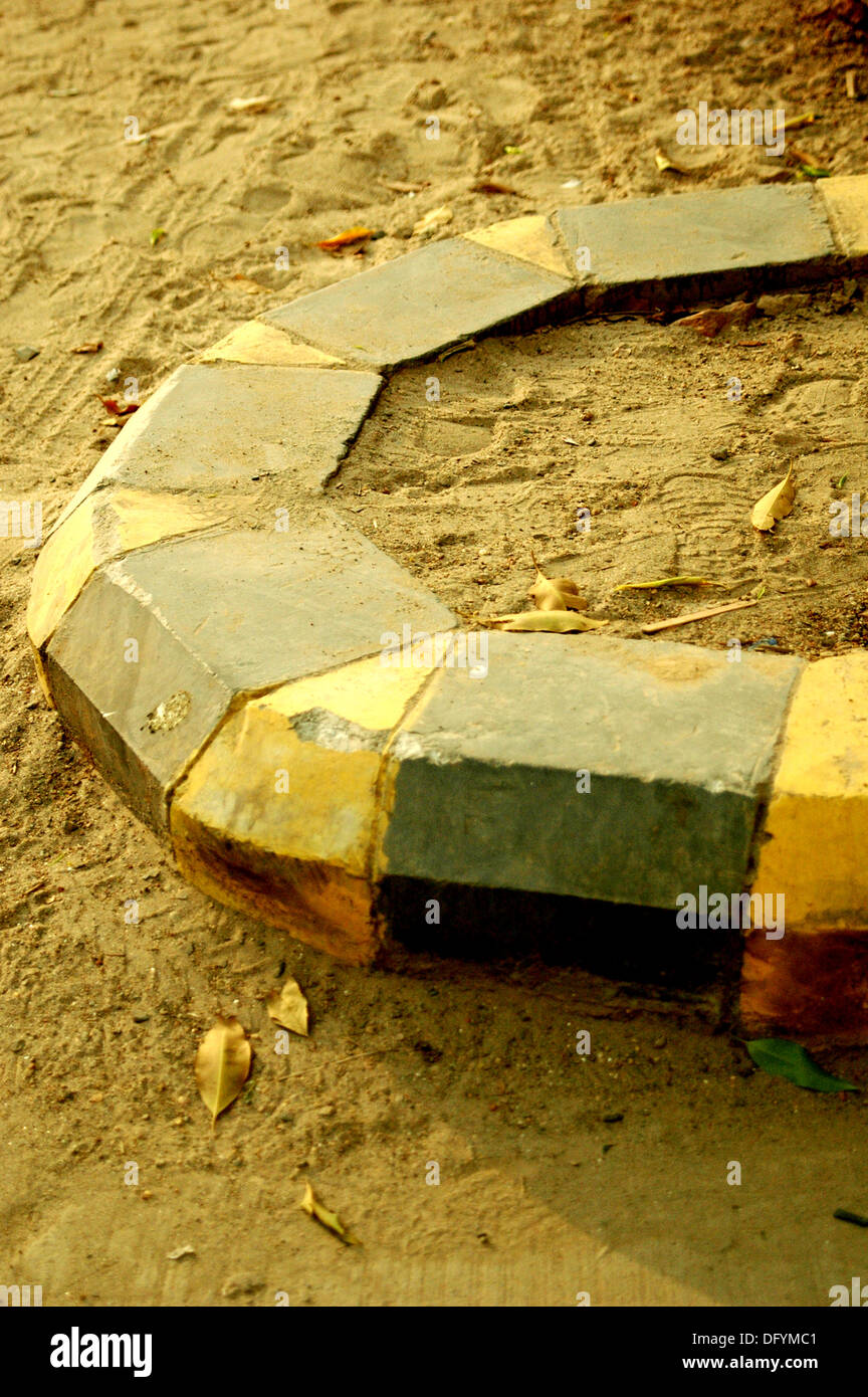 Roadside path captured in the shape of an alphabet 'C' Stock Photo - Alamy