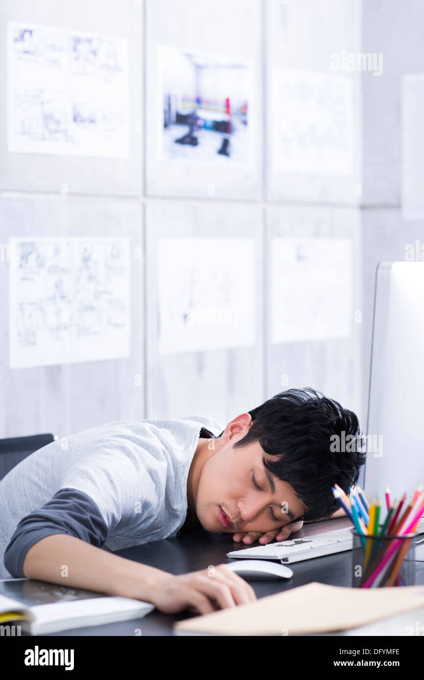 Asian man sleeping in chair hi-res stock photography and images - Alamy
