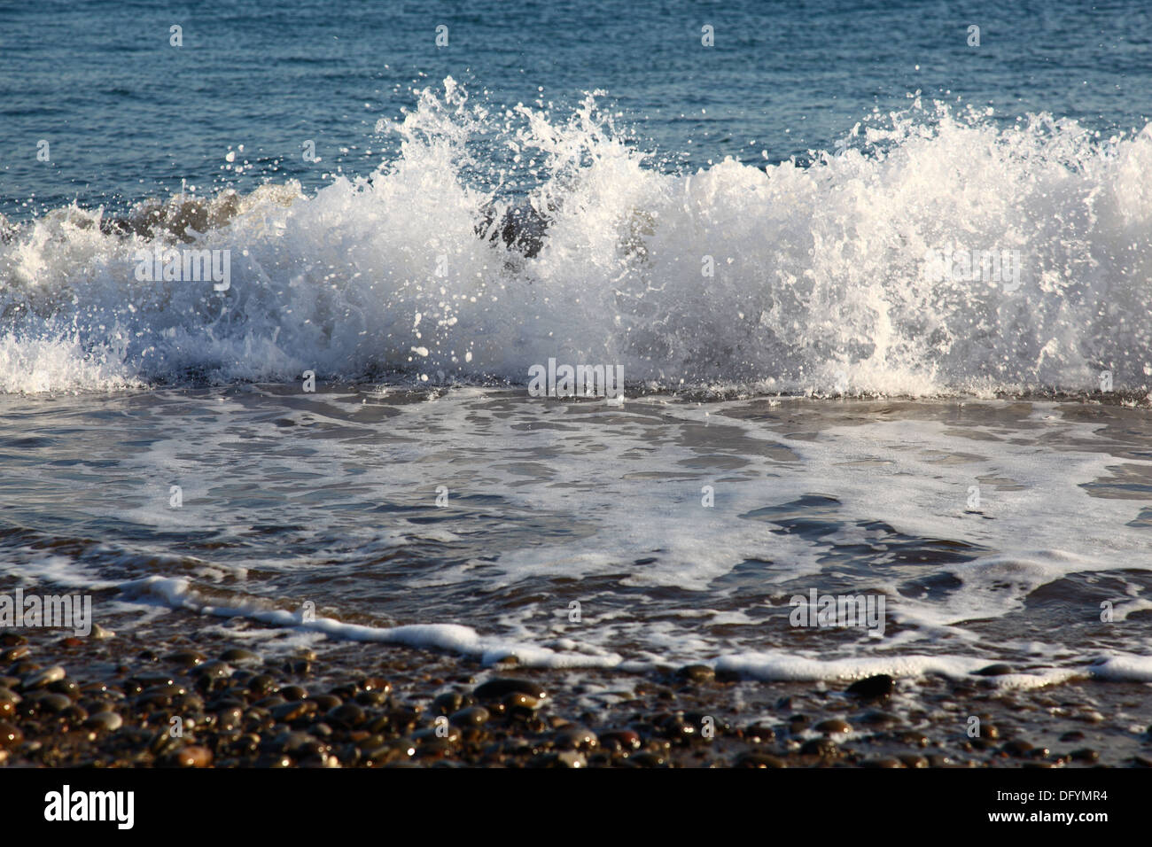 Sea surf on a beach Stock Photo - Alamy