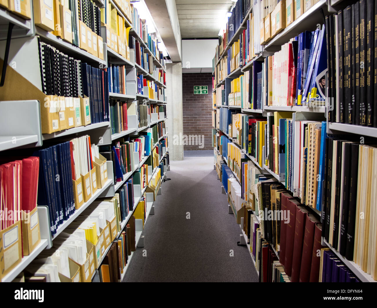 Library books on shelves Stock Photo - Alamy
