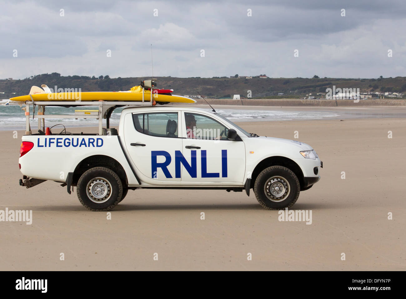 RNLI Lifeguards on St Ouen's beach Jersey Mitsubishi L200 RNLI ...