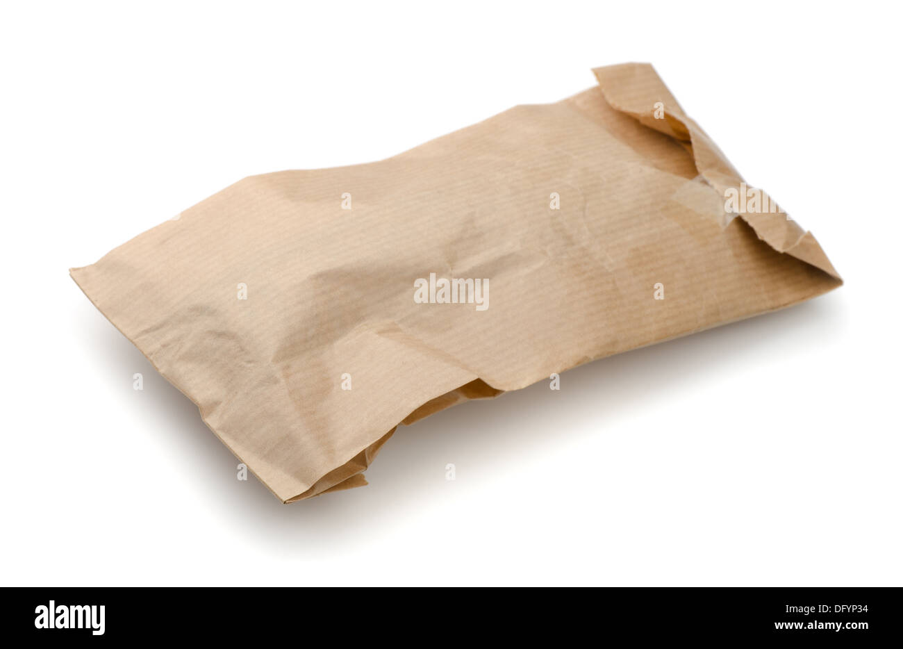 Closed crumpled paper package isolated on white Stock Photo - Alamy