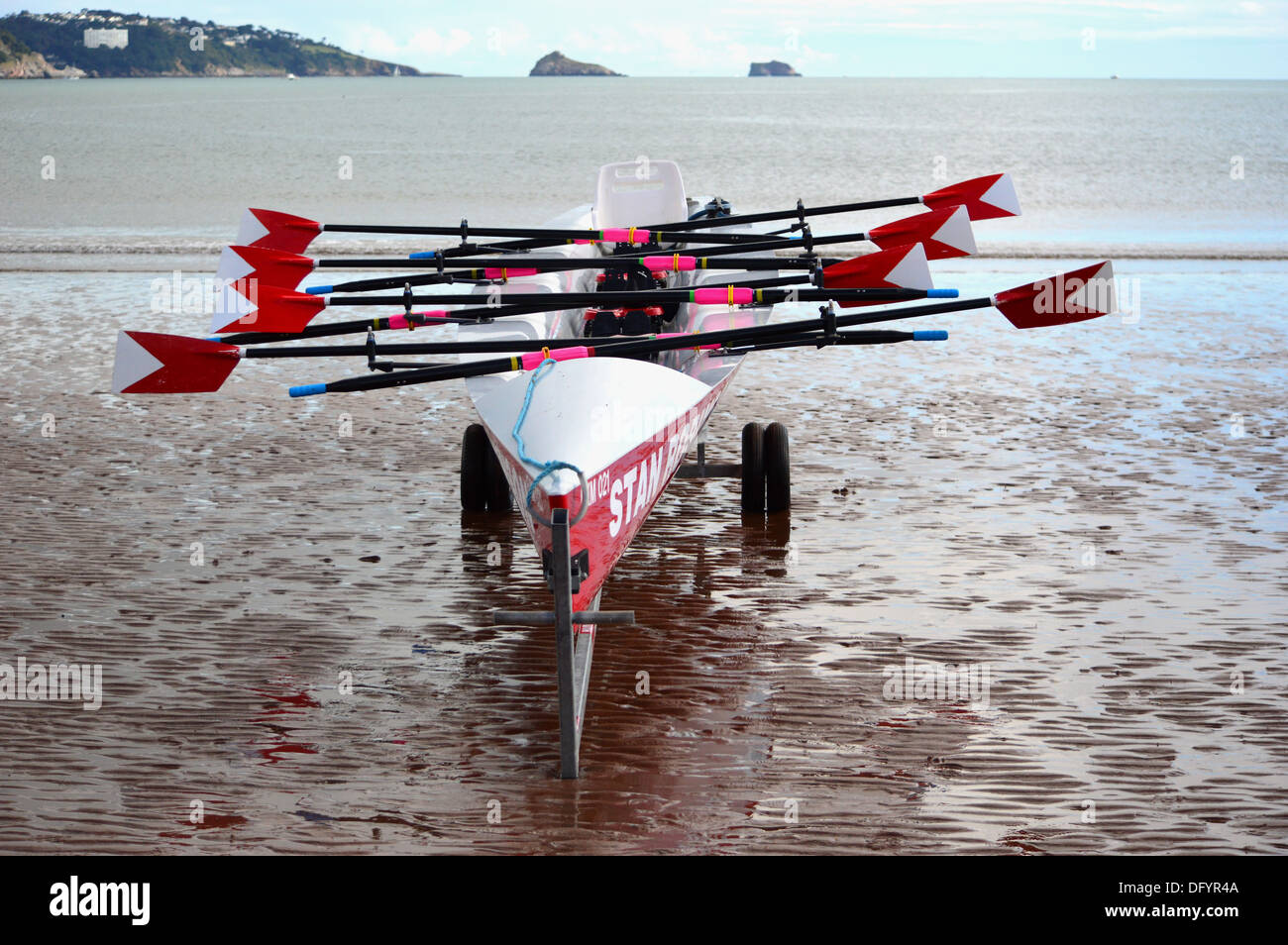 A rowing boat, fisa, on Paignton beach, ready for the Triangular Race ...