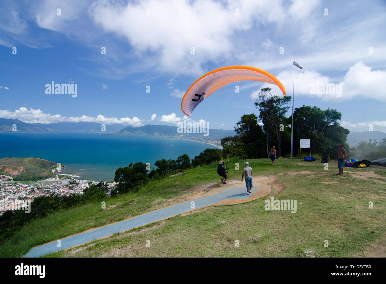 jumping with parachute in top of montain at Caraguatatuba, Sao Paulo ...