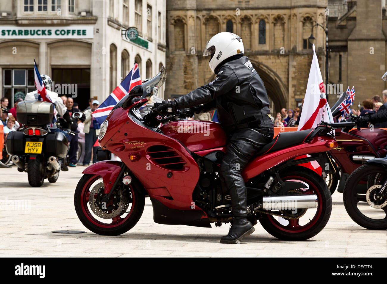 Biker on red Triumph Trophy limited edition motorcycle Stock Photo - Alamy