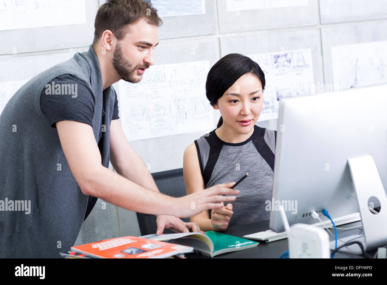 Adults working hi-res stock photography and images - Alamy