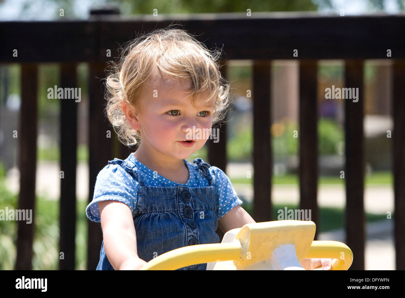 Cute Toddler Girl Playing Stock Photo - Alamy