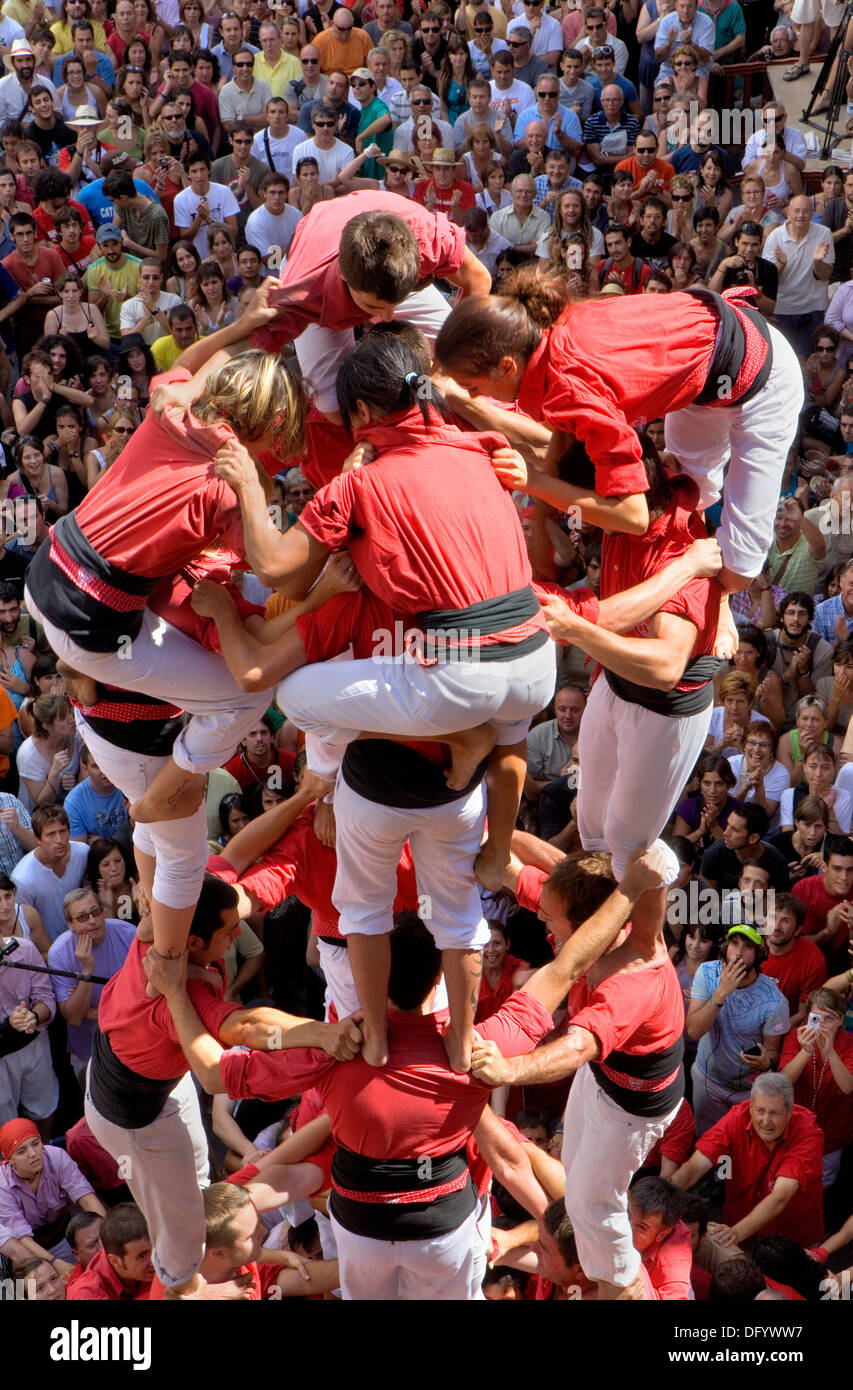 'Castellers' building human tower, a Catalan tradition Stock Photo - Alamy