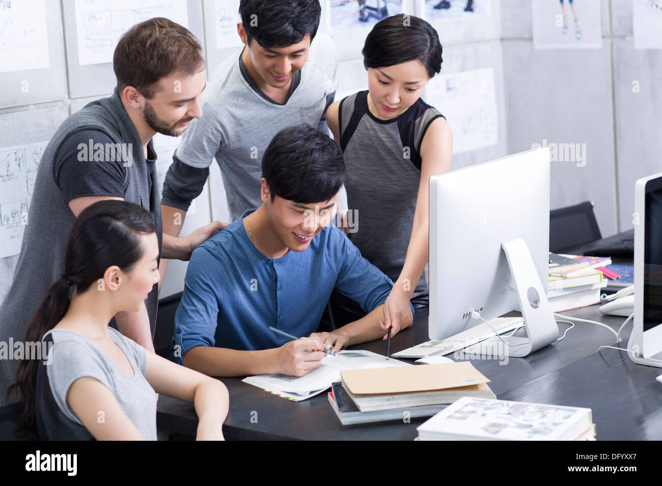 Adults working hi-res stock photography and images - Alamy