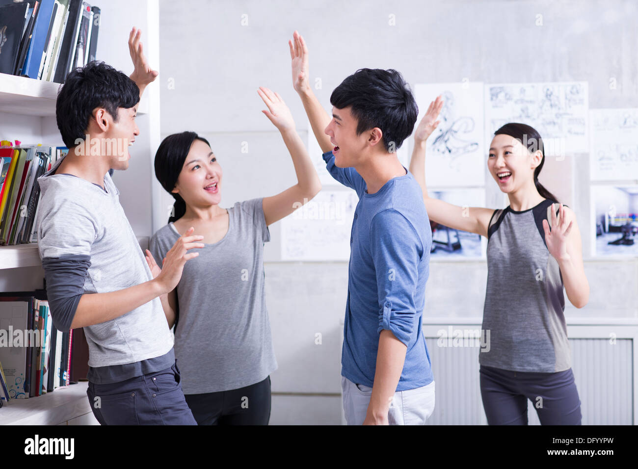 Excited white collar workers celebrating Stock Photo - Alamy