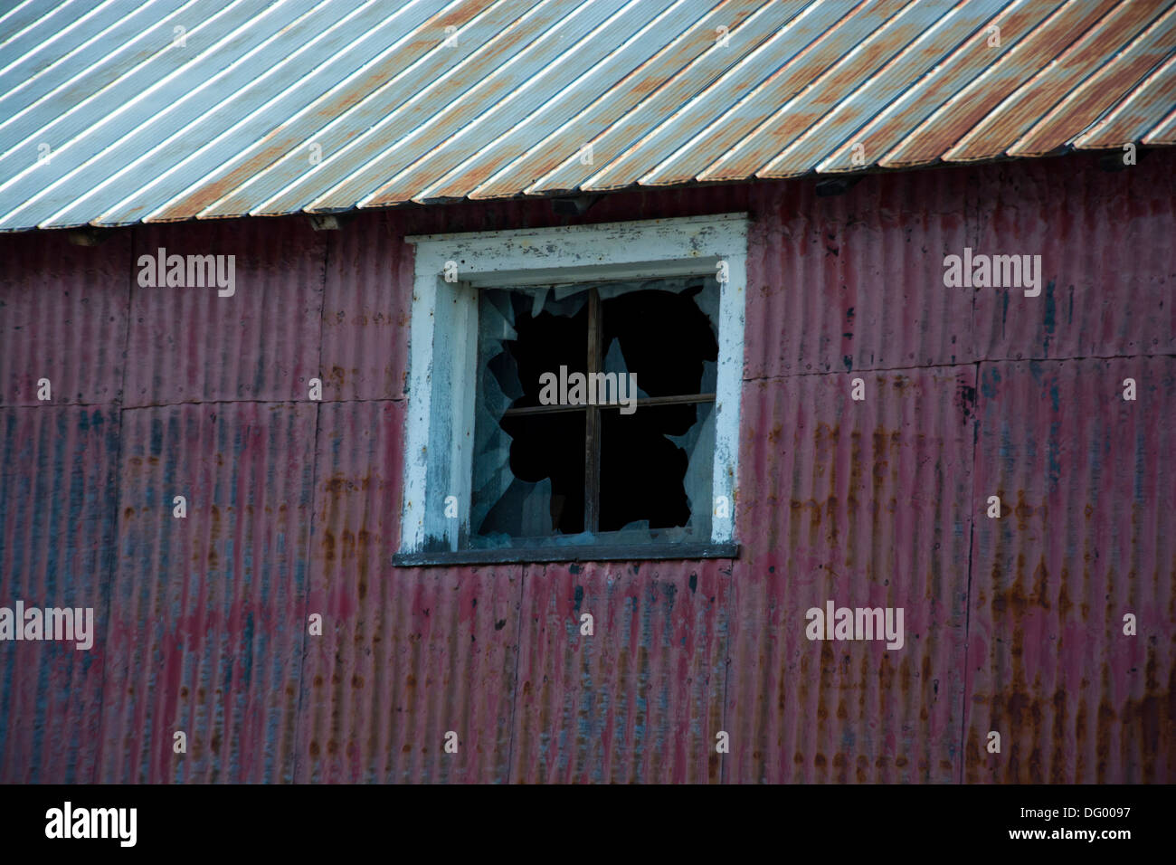 A derelict building with a broken window Stock Photo - Alamy