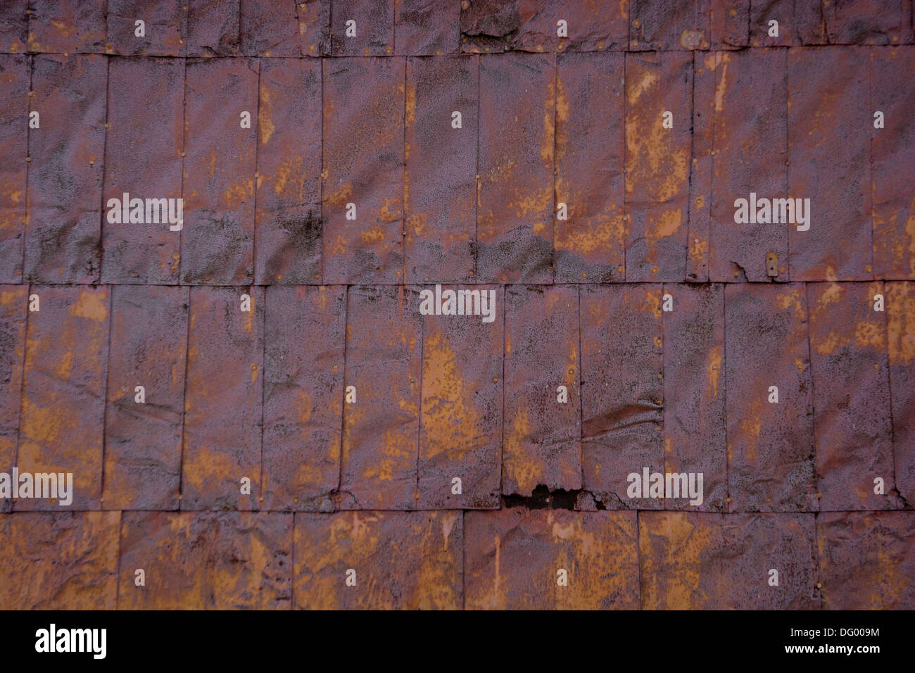 A rusted metal wall of a derelict building Stock Photo - Alamy