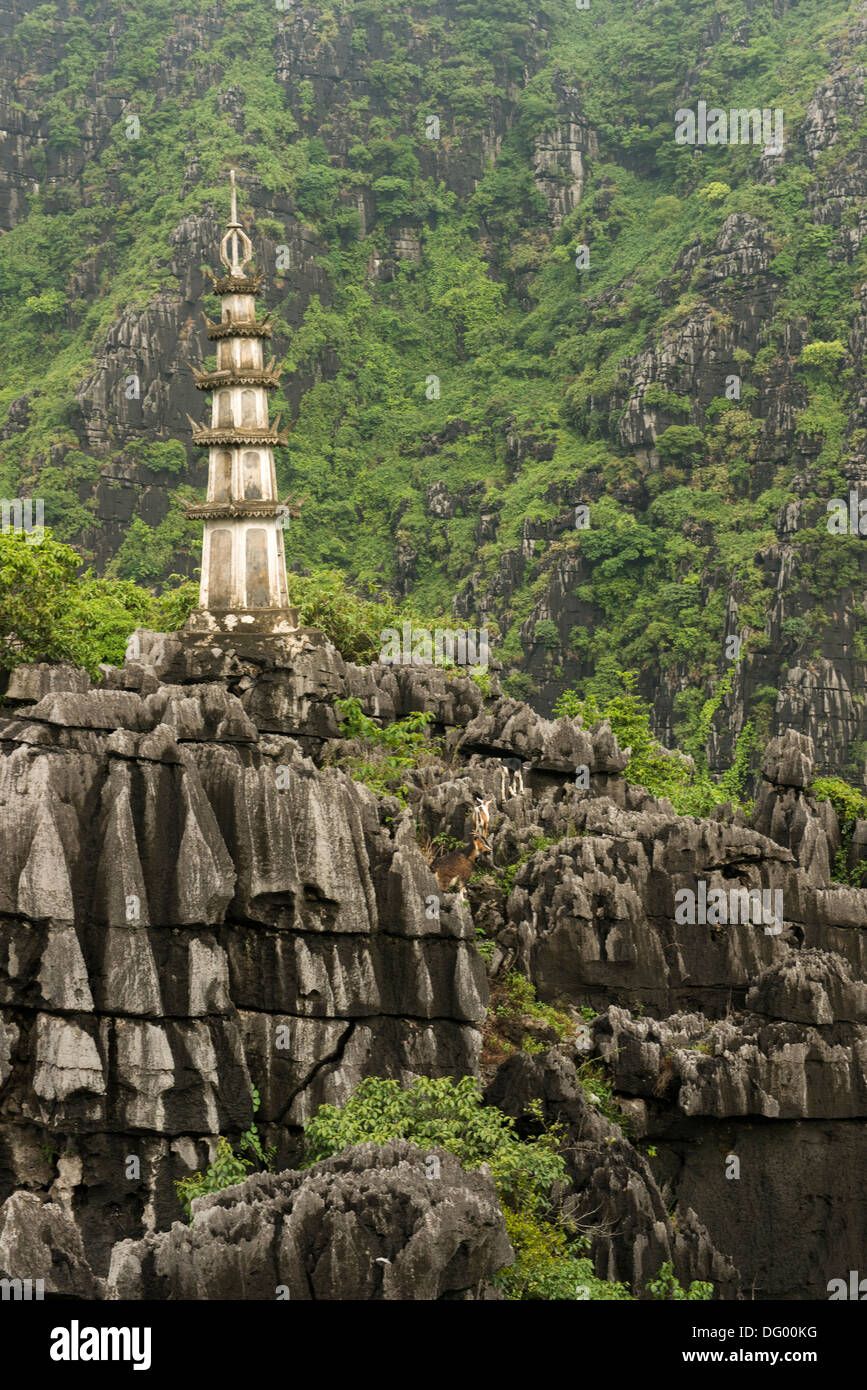 temple on limestone karst mountains in Ninh Binh, Vietnam Stock Photo ...