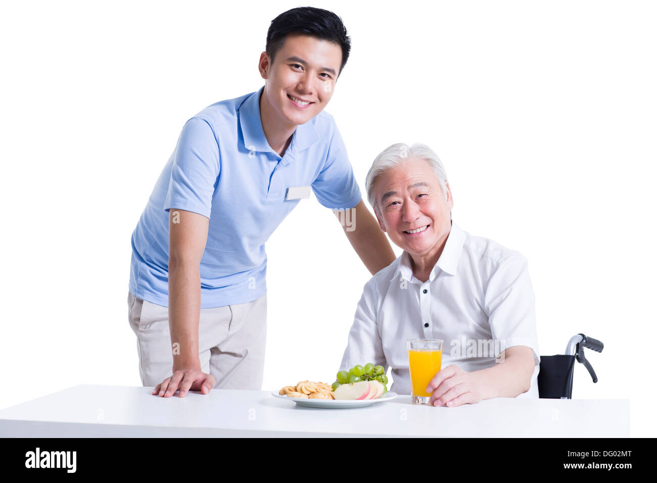 Disabled senior man having breakfast in nursing home Stock Photo - Alamy