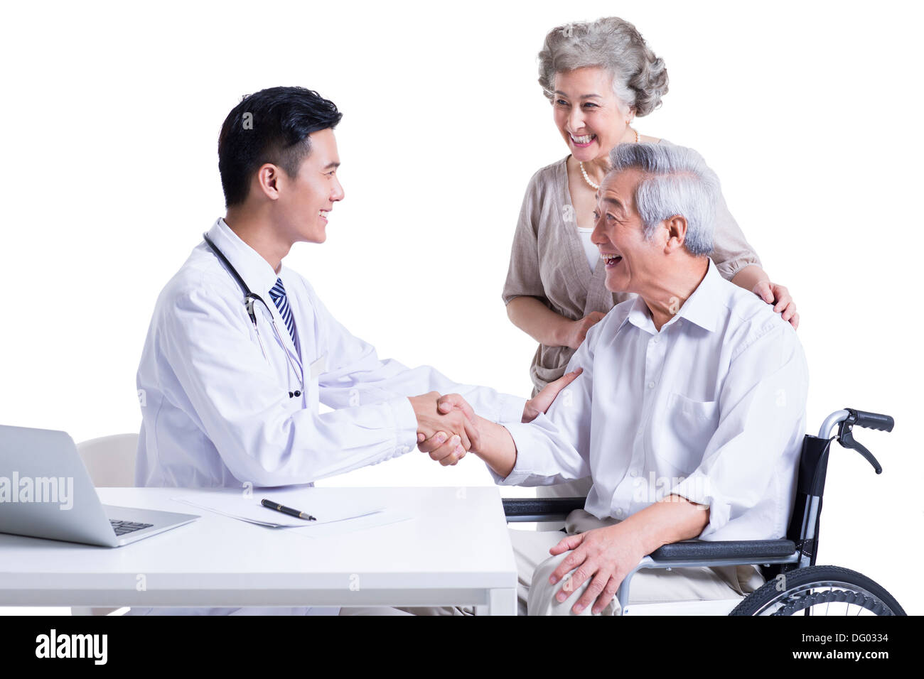 Doctor and patient shaking hands Stock Photo - Alamy