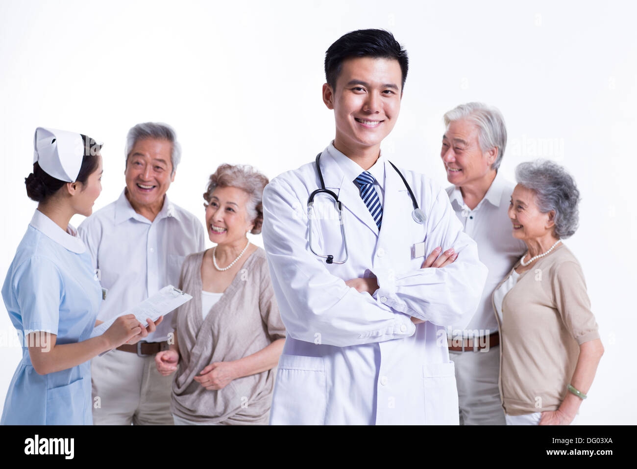 Hospital staff with senior couples Stock Photo - Alamy