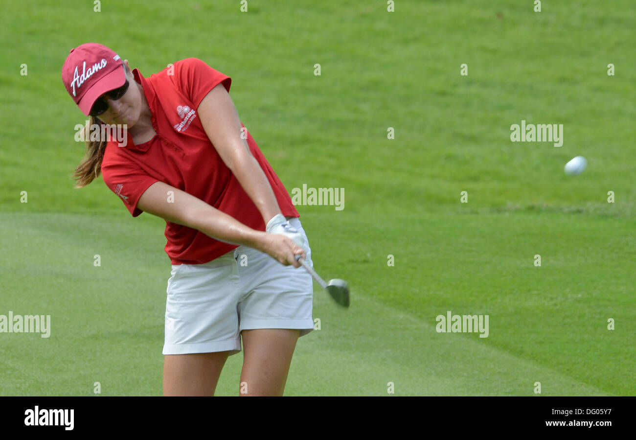 Kuala Lumpur, Malaysia. 11th Oct, 2013. Alison Walshe of USA hits third ...