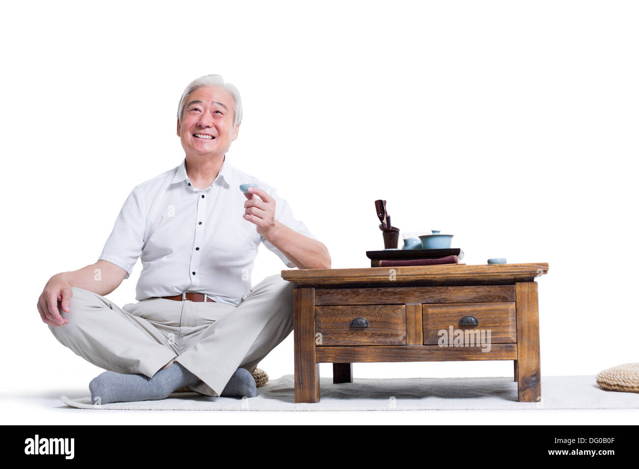 Man at home drinking tea Cut Out Stock Images & Pictures - Alamy