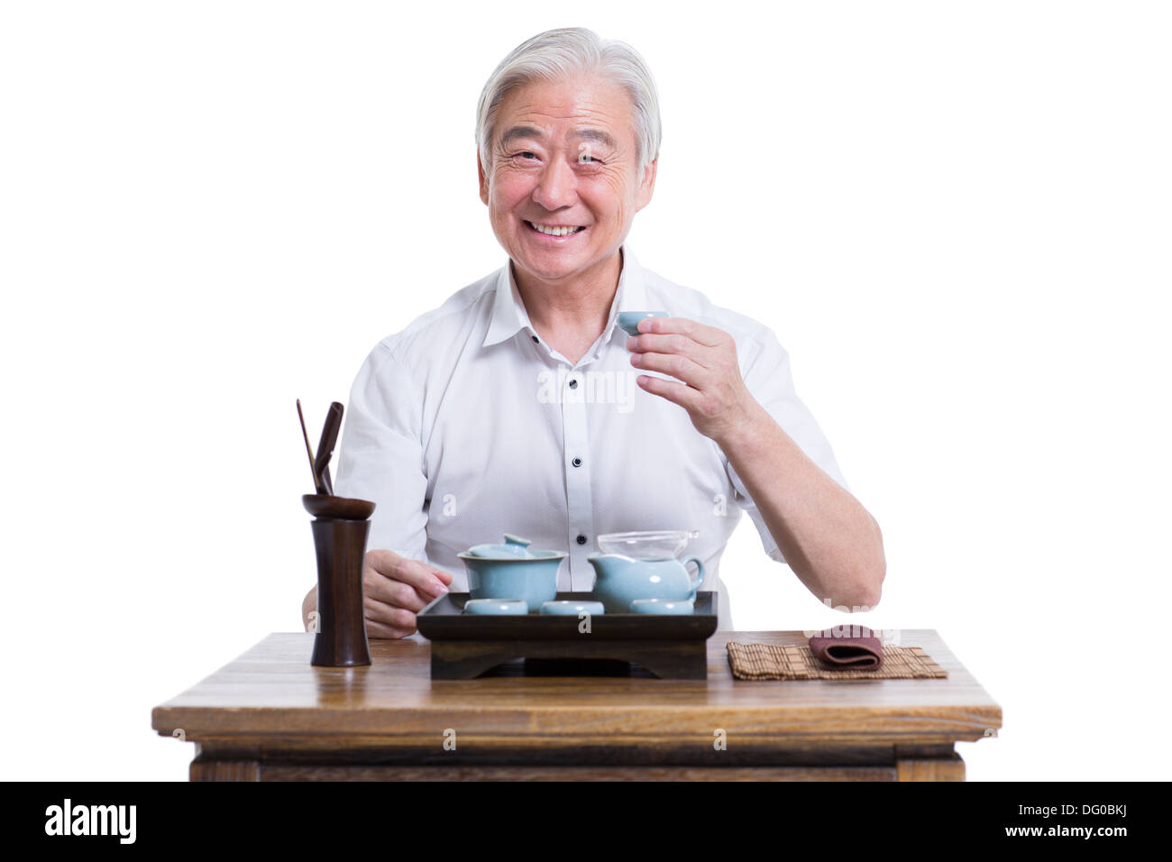 Happy senior man having tea Stock Photo - Alamy