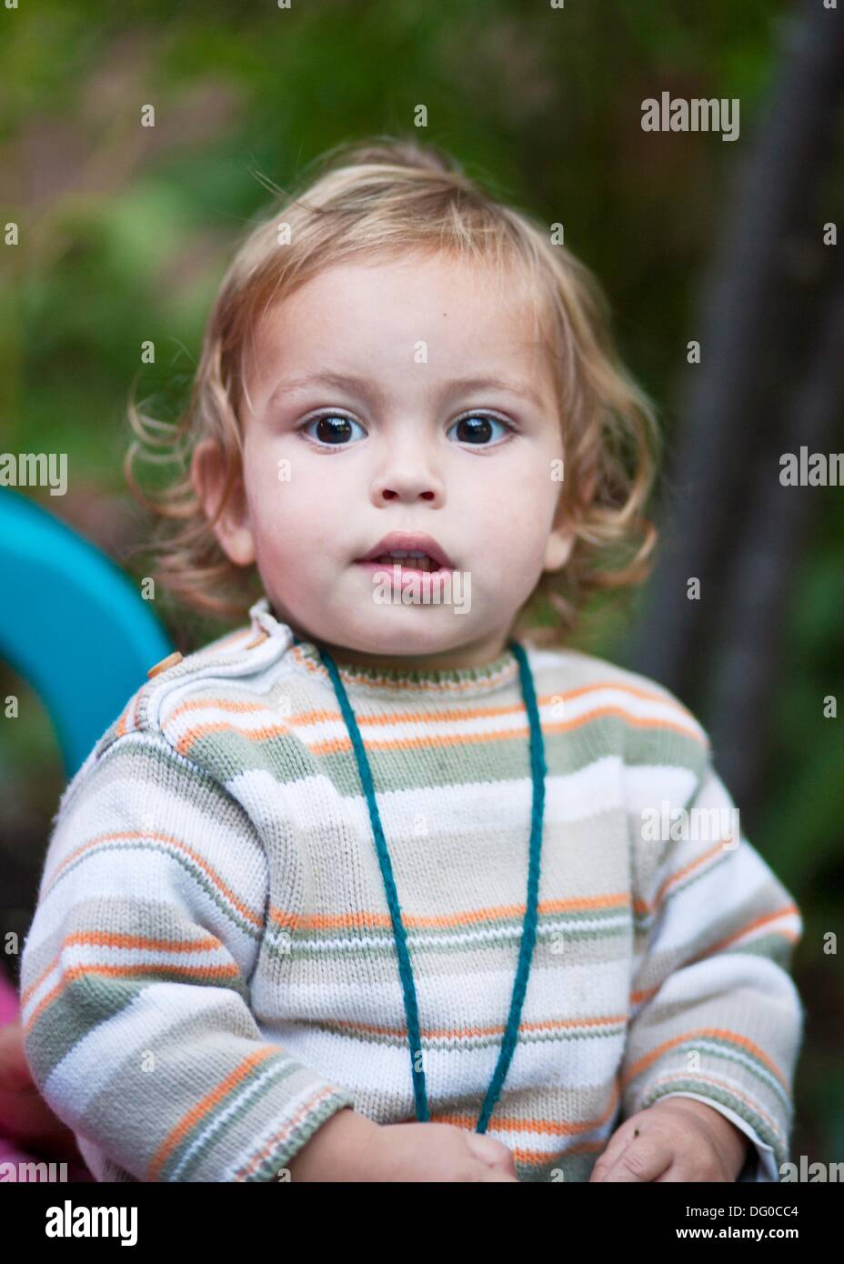Boy biting lip hi-res stock photography and images - Alamy