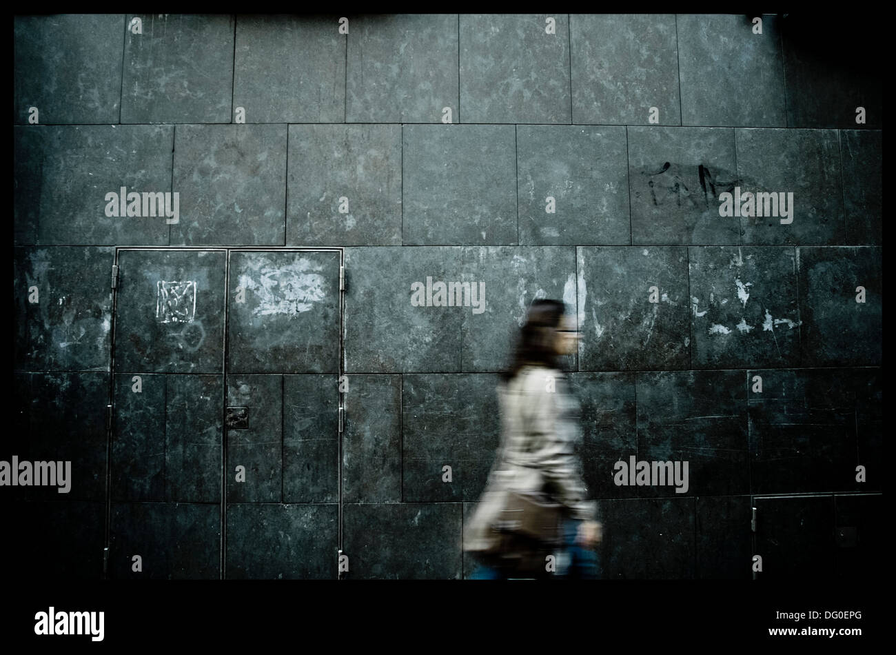 Man passing through wall hi-res stock photography and images - Alamy