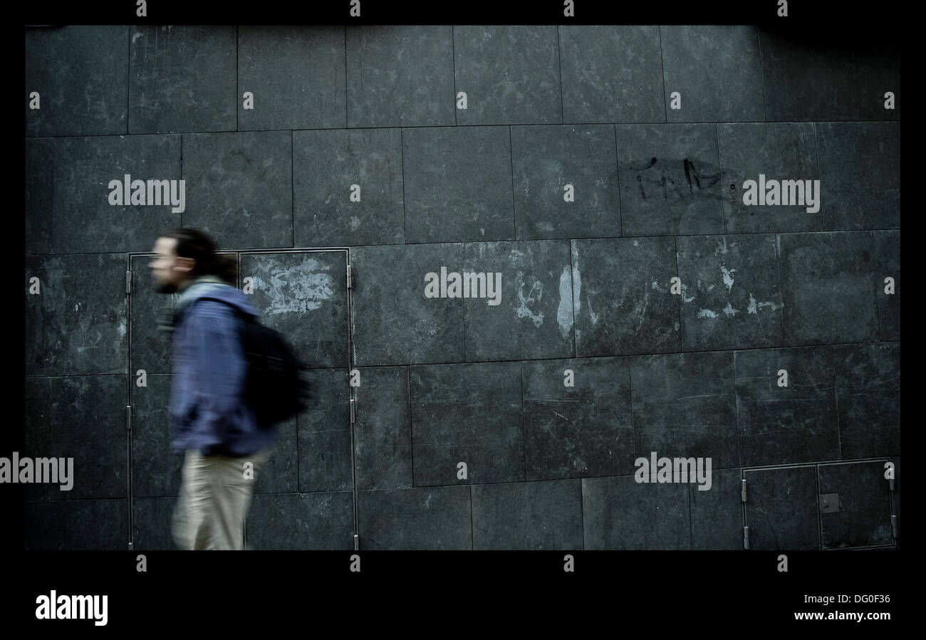 Man passing through wall hi-res stock photography and images - Alamy