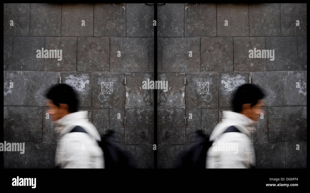 Man passing through wall hi-res stock photography and images - Alamy
