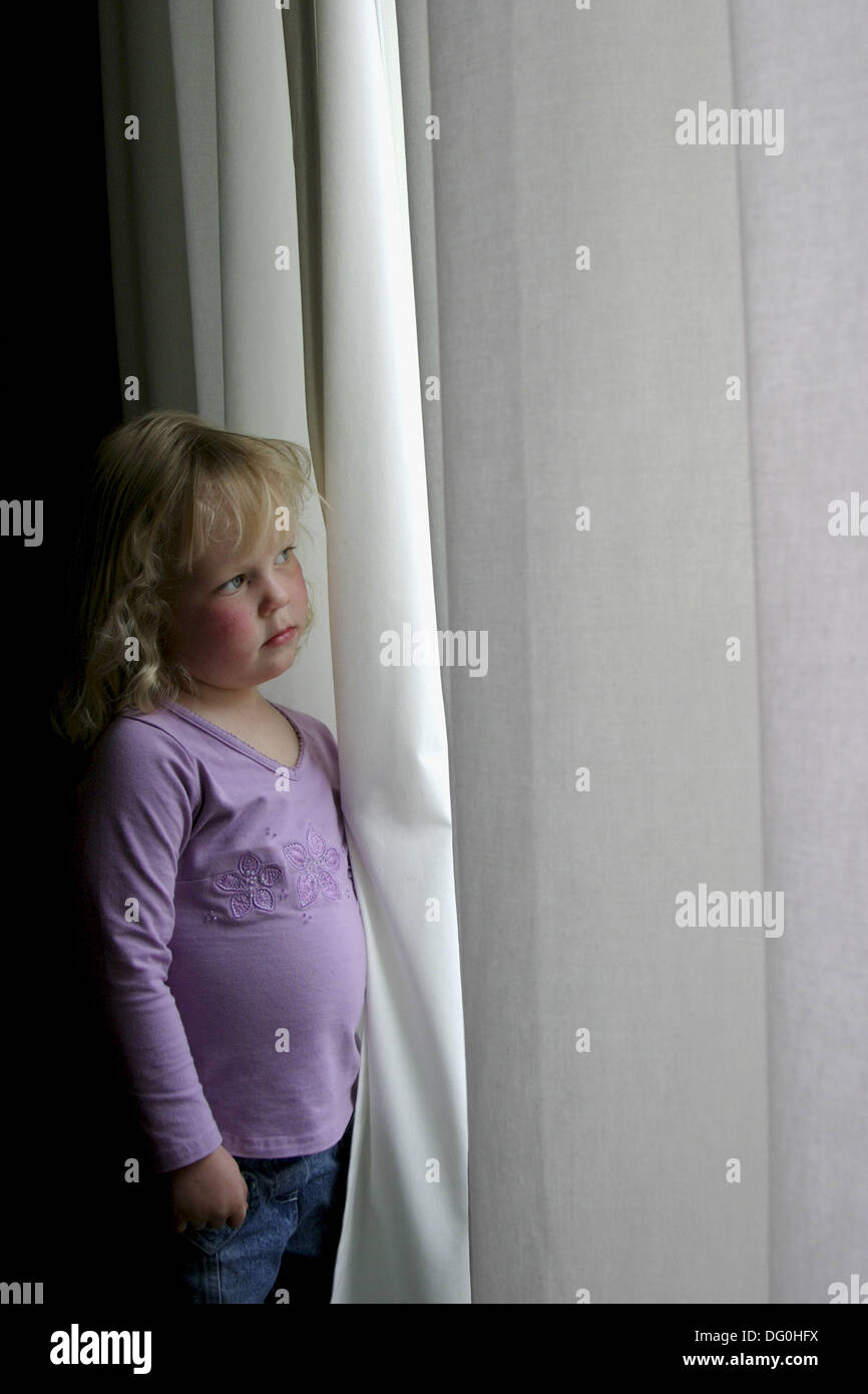 Peering out curtain hi-res stock photography and images - Alamy