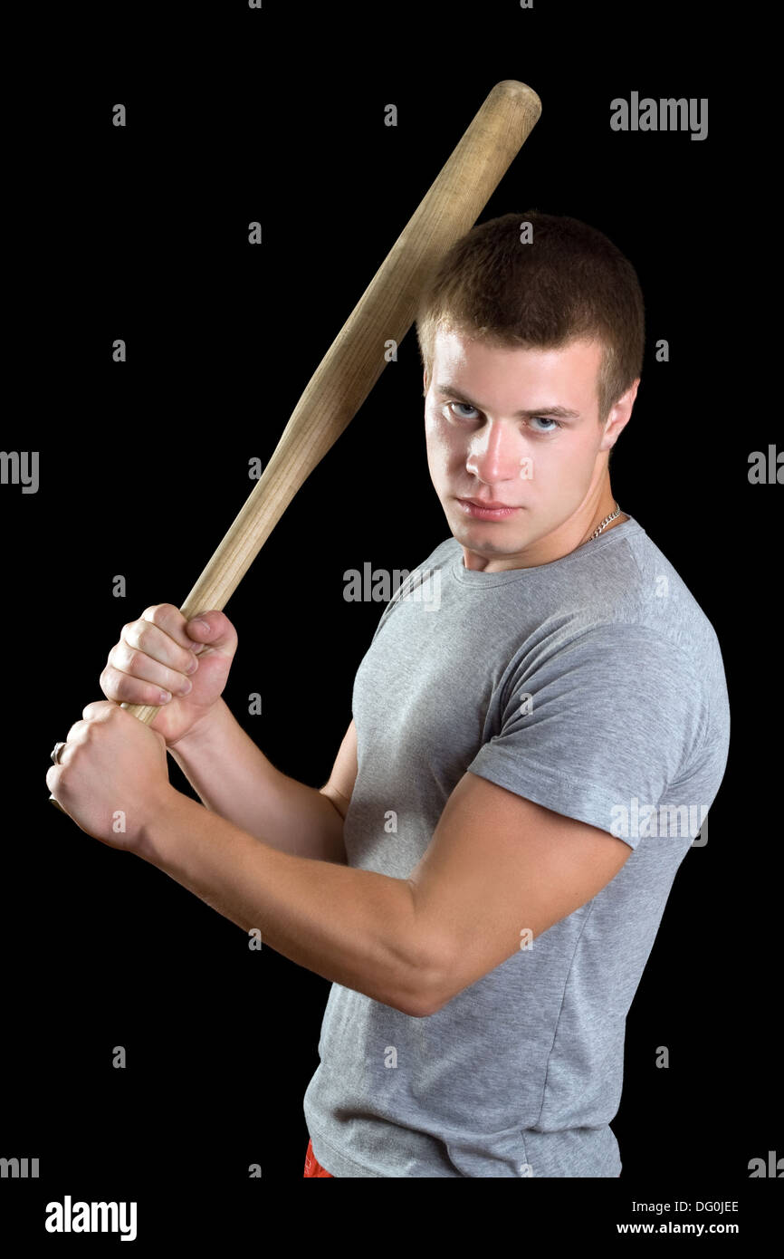 Aggressive young man with a bat. Isolated Stock Photo - Alamy