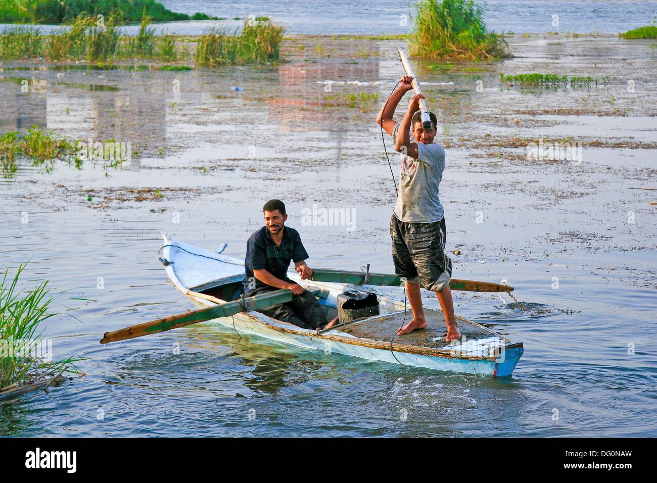 Egyptian man rowing small wooden boat the nile river hi-res stock ...