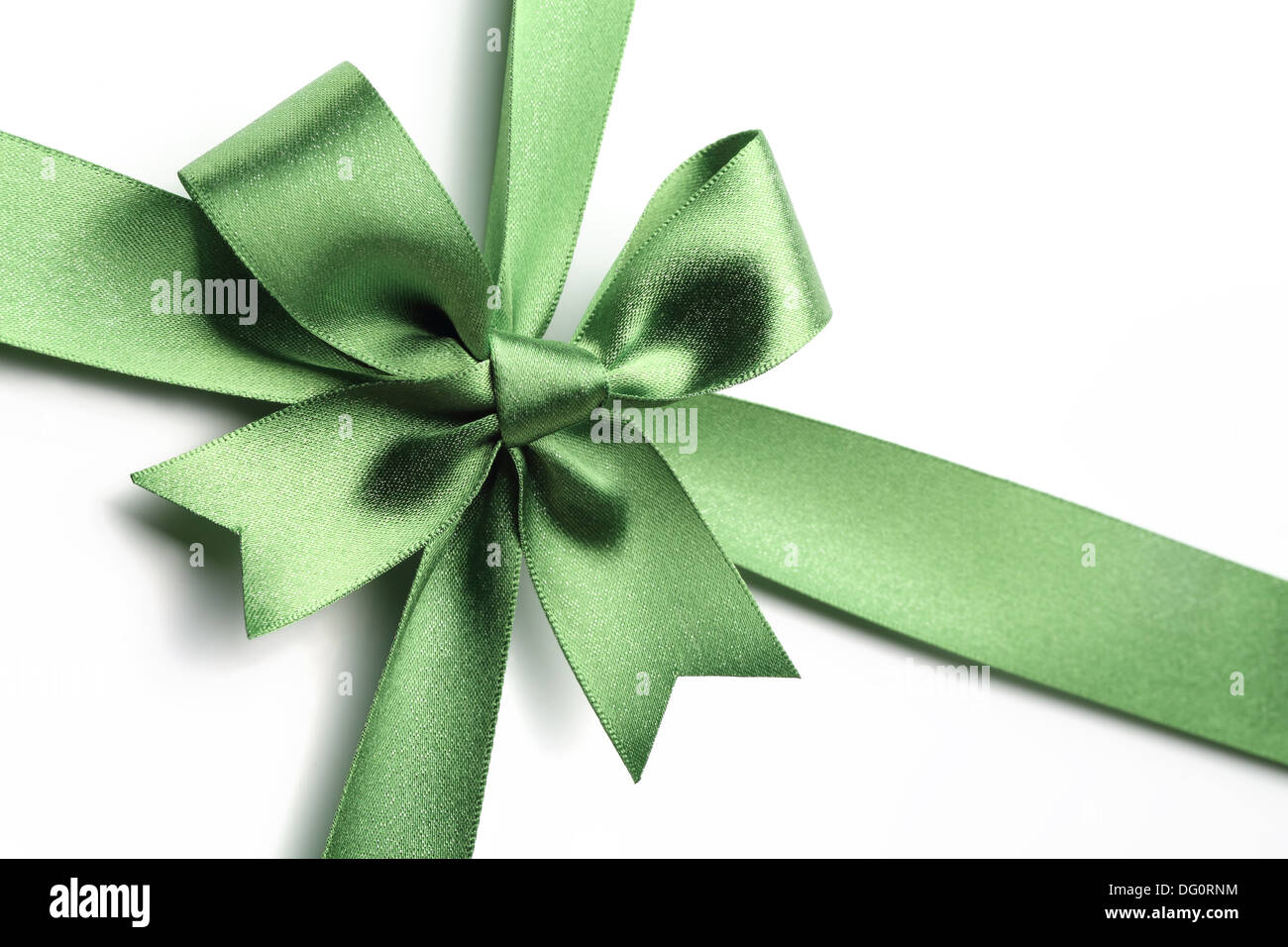 Green ribbon bow isolated on white background Stock Photo - Alamy