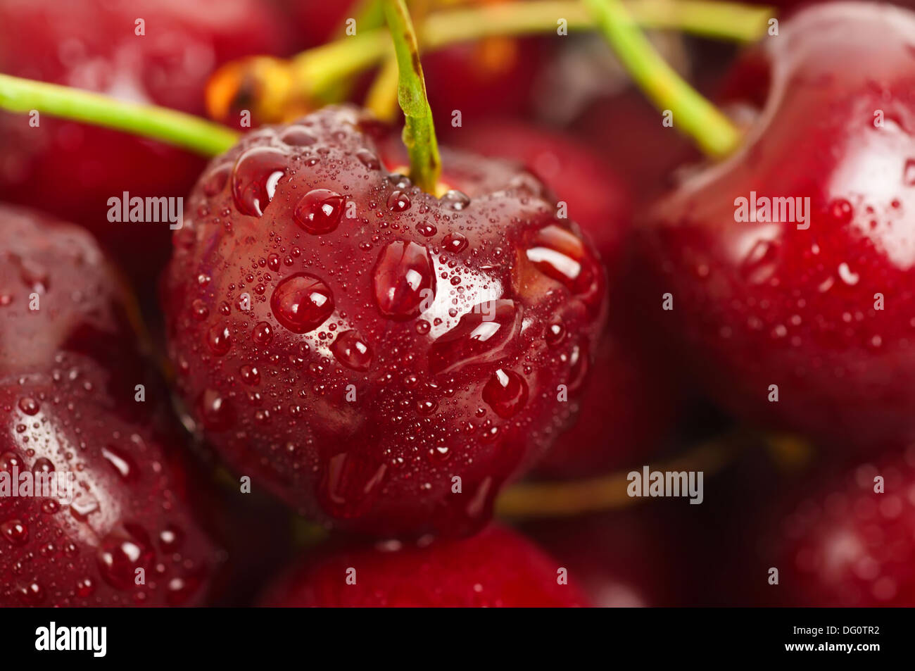 Sweet cherry background Stock Photo - Alamy