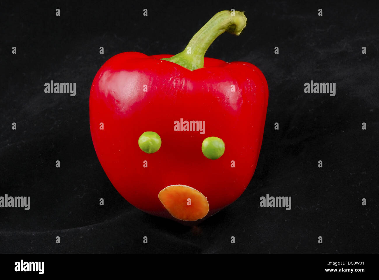 Character made of vegetables pepper face with peas eyes, and carrot ...