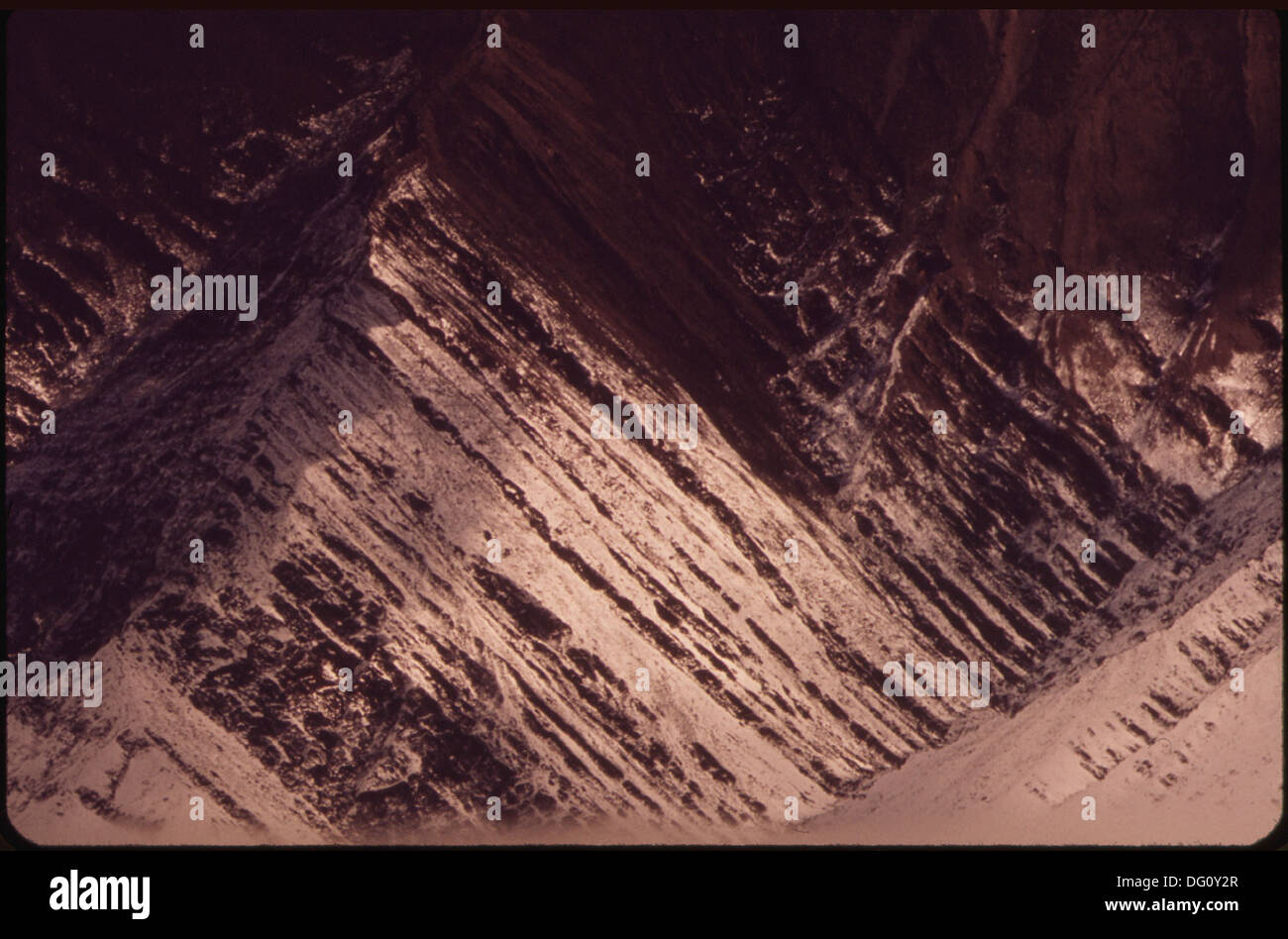 This photograph shows the tilted horizontal bedding of rock strata ...