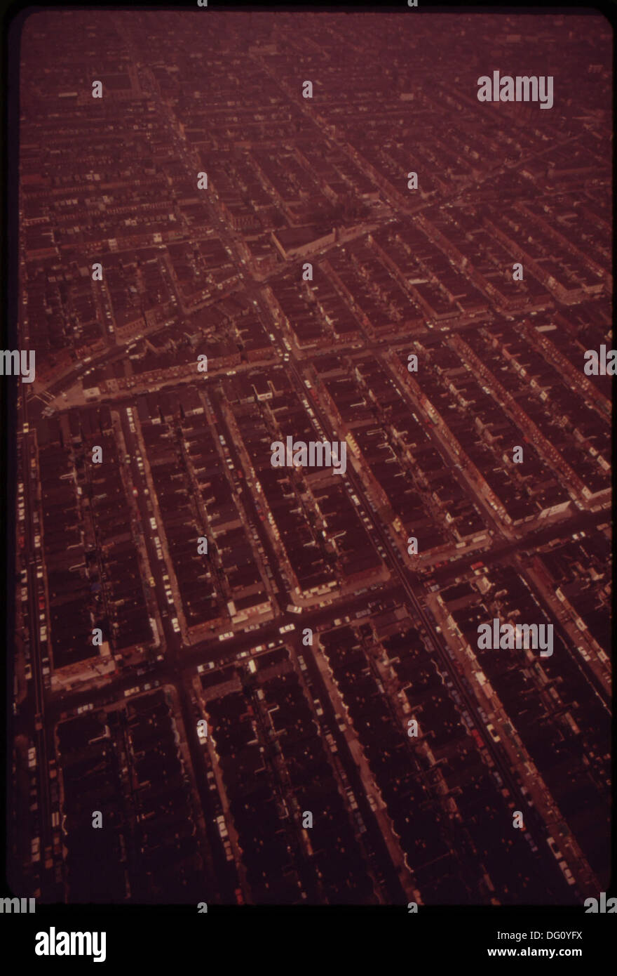 This photograph features row houses, showing their uniform design and ...