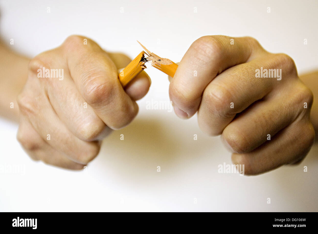 Woman breaking pencil hi-res stock photography and images - Alamy