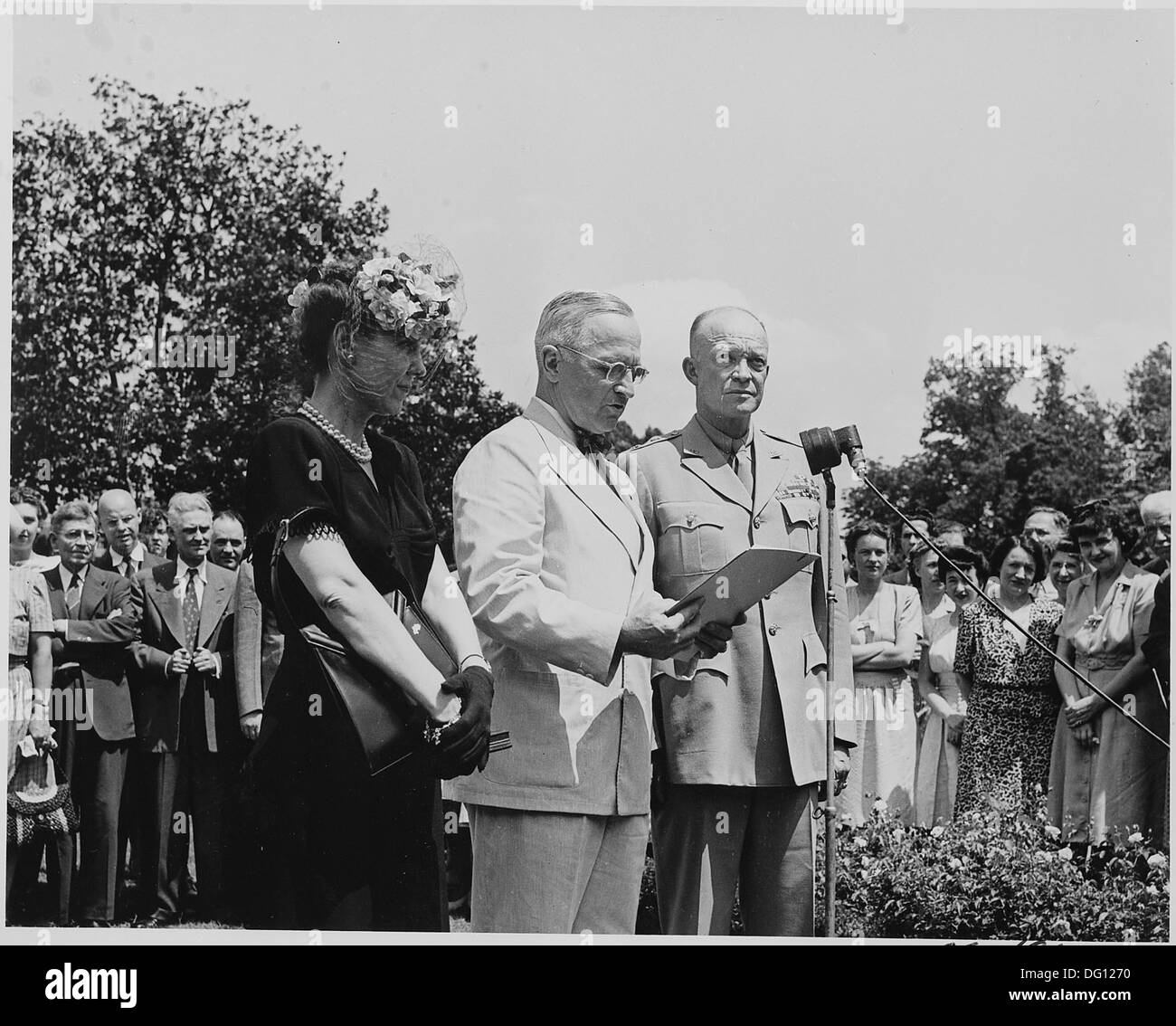 This image shows President Harry S. Truman reading the citation for ...