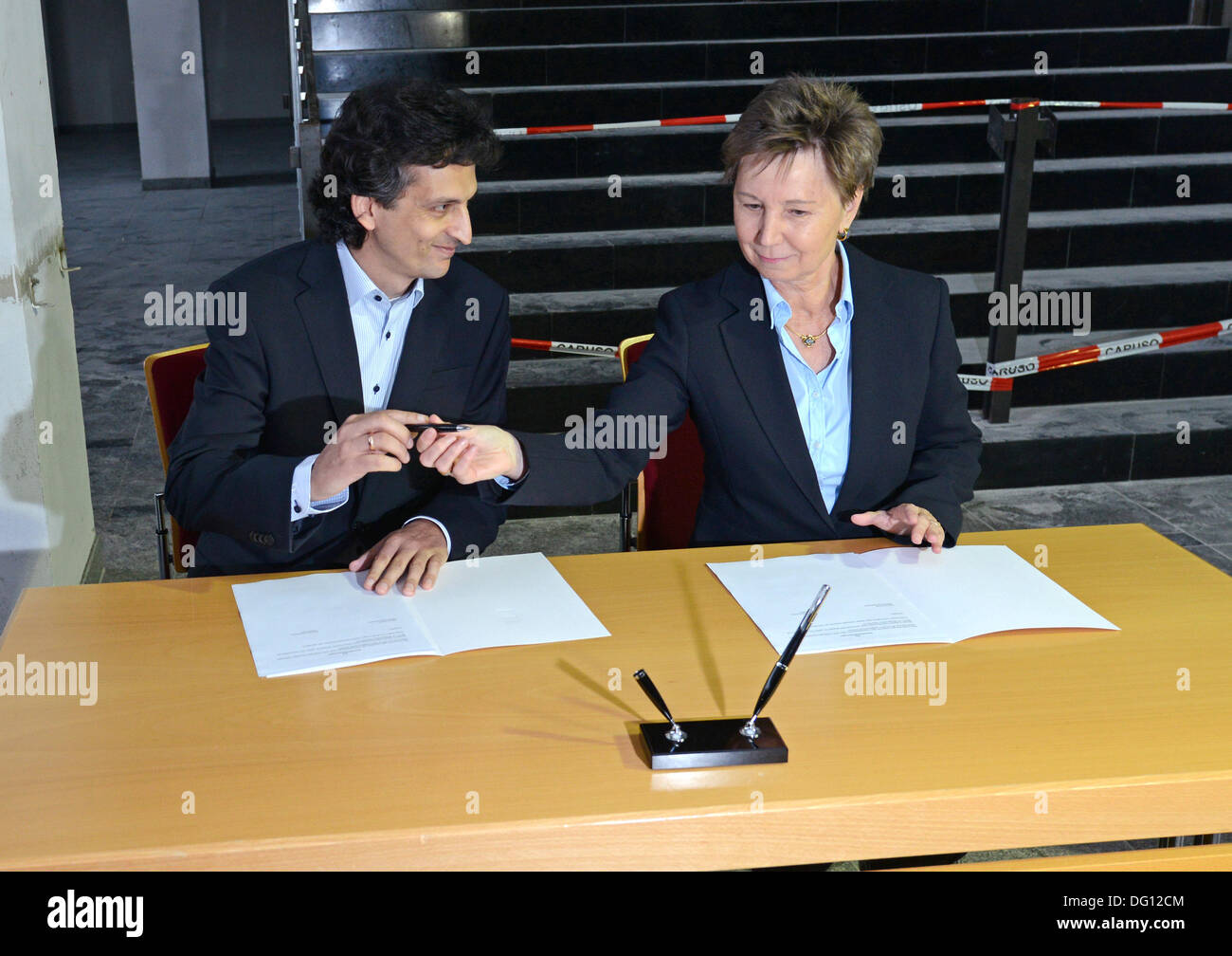 Dresden, Germany. 11th Oct, 2013. Conductor Michael Sanderling (L ...