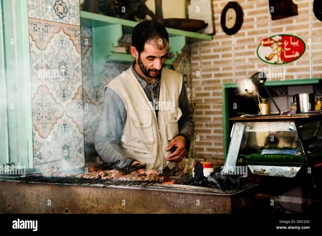 A famous grill house in the narrow streets of the old city of Sefrou in ...