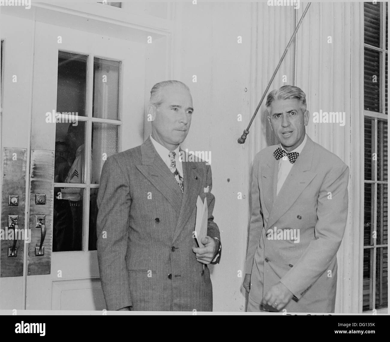 Photograph of two unidentified persons outside the White House on the ...