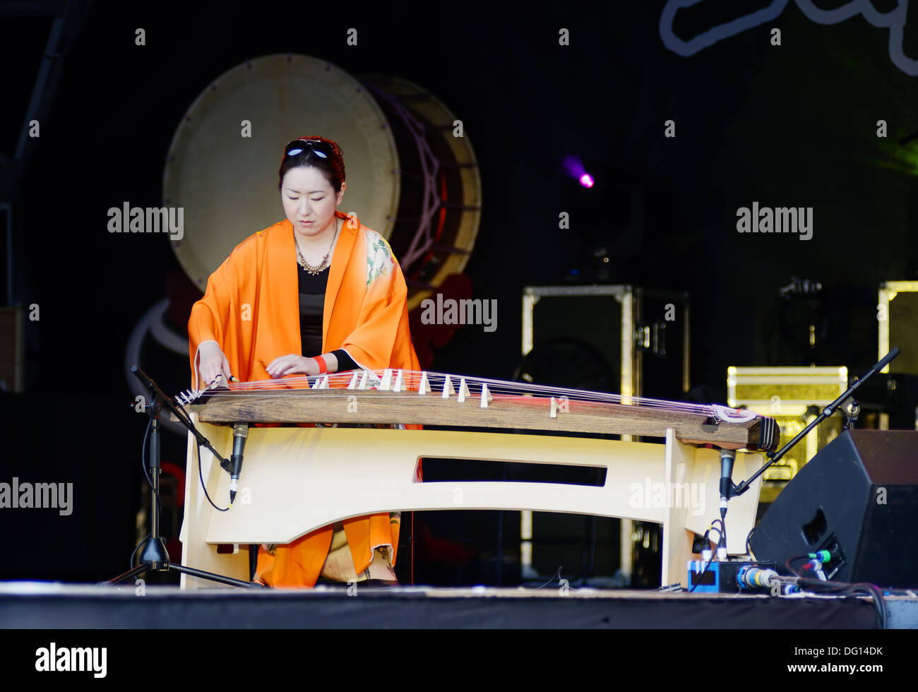 Japanese musician Fuyuki Enokido plays her traditional instrument a ...