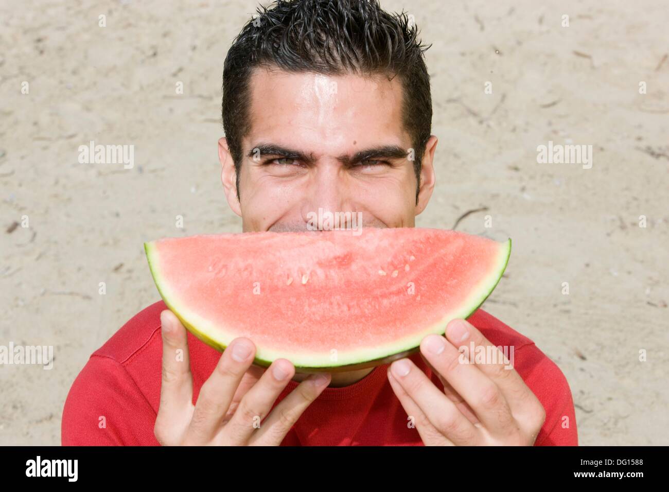 Melon head man holding melon hi-res stock photography and images - Alamy