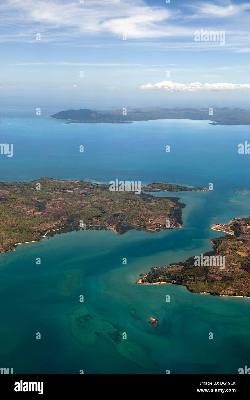 aerial view over Ambato cape, Nosy Faly island and Nosy Be background ...