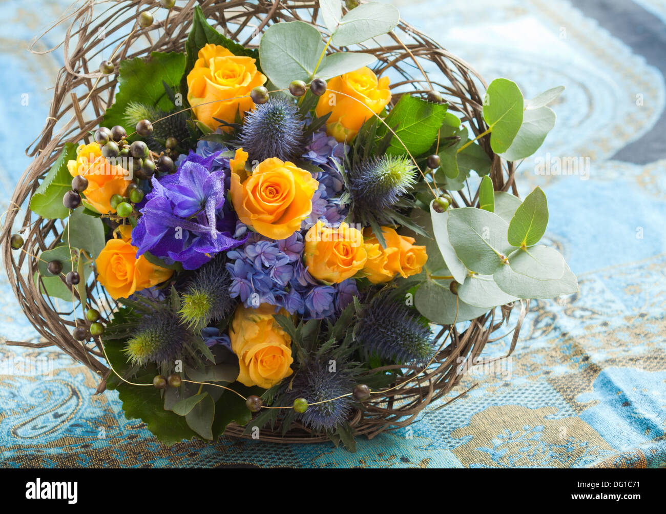 beautiful blue and yellow bouquet with roses Stock Photo - Alamy